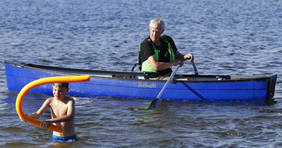 Photos: People take to waters in canoes, kayaks for Family Paddle Day ...