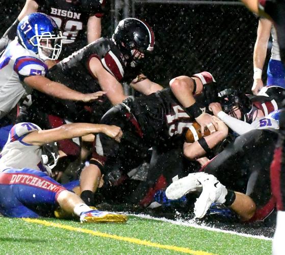 Bison win D-9 title 13-7 over Dutch in torrential rainstorm | Sports ...