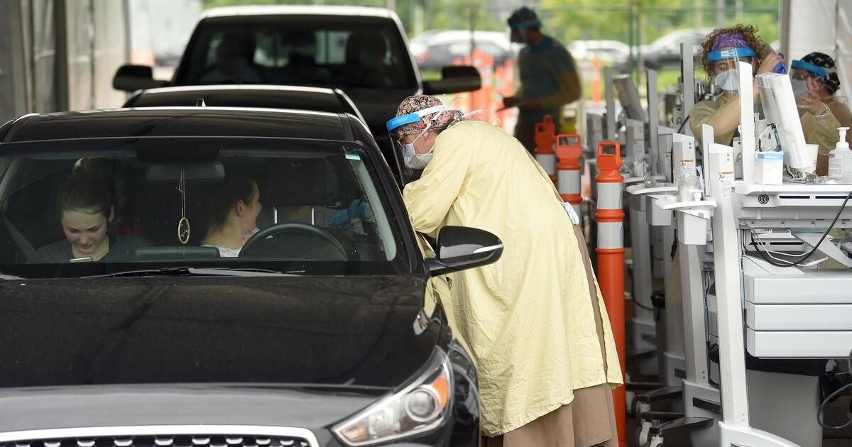 Long lines at Kitchener drive-thru COVID testing causes frustration