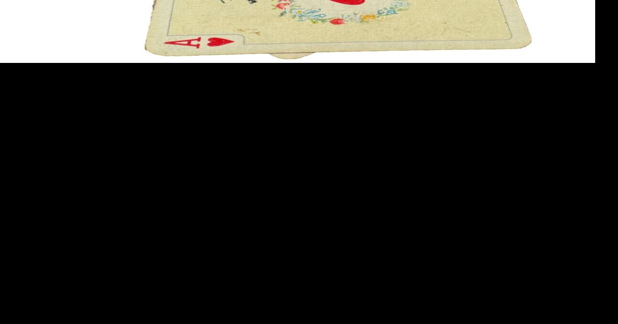 Appraising old playing cards, a painting and a silver dish