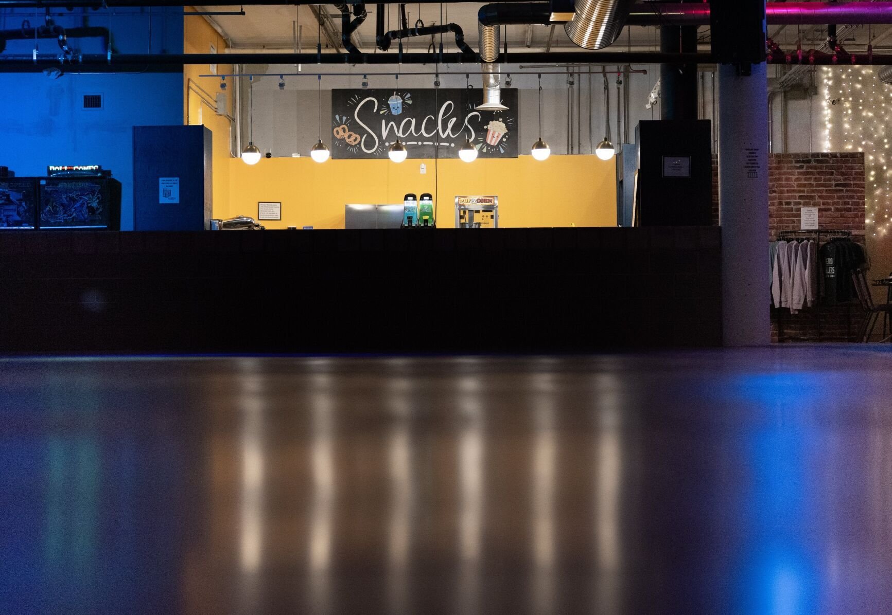 Retro Rollers indoor skating rink under Kitchener auto store