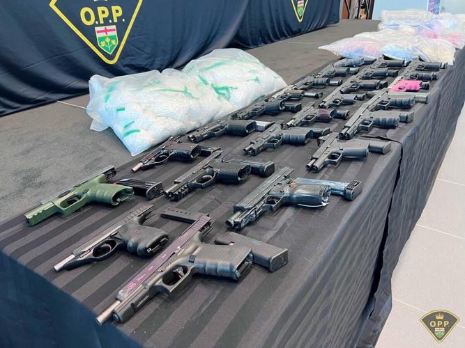 Two Waterloo Region women among 23 charged in $8-million gun, drug busts