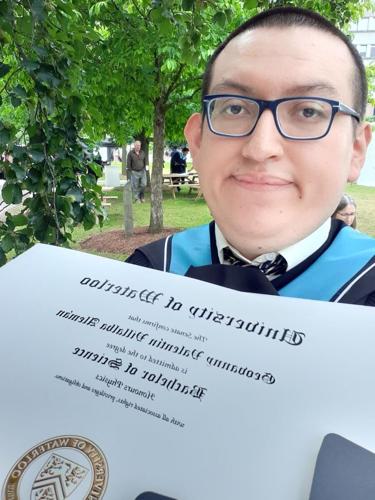 Man charged in university stabbing remains in custody