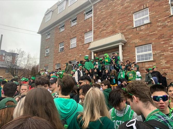 Partiers spill onto Marshall Street at Regina Street in Waterloo for St ...