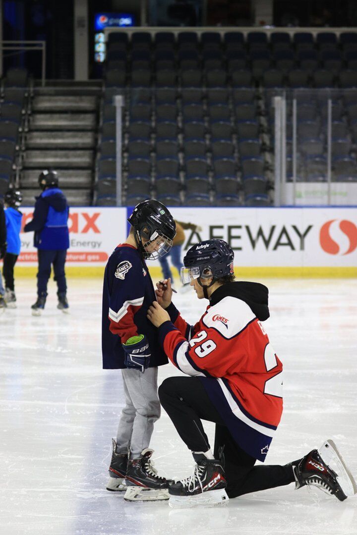 Canes skate with School Safety Patrollers