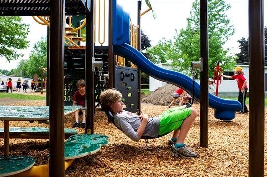 Happy kids open the best playground ever