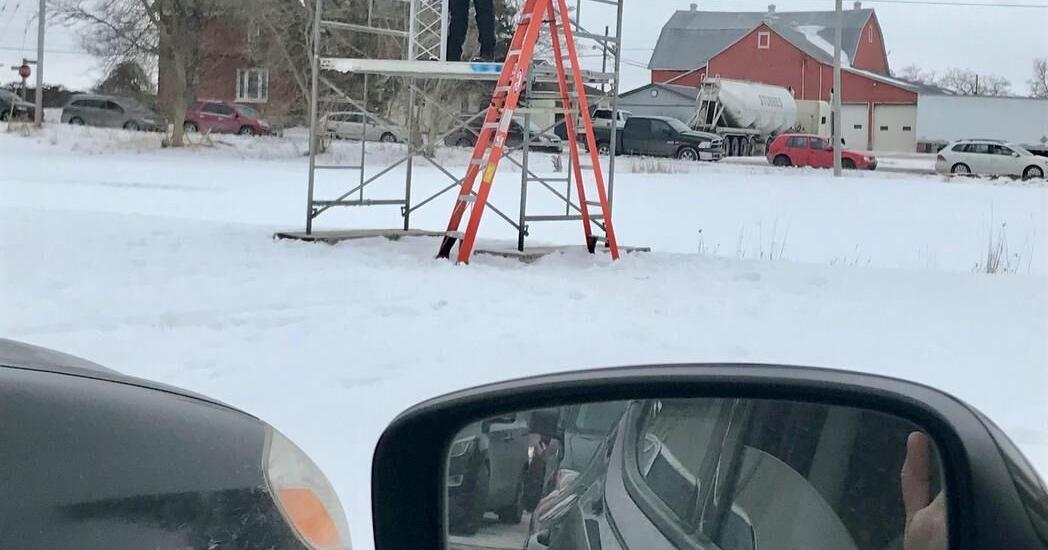 A mass honking of horns as Trinity Bible Chapel holds drive-in service