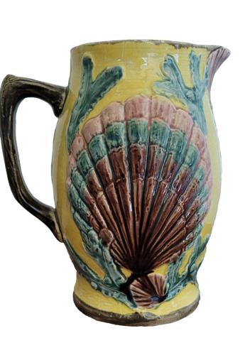 Appraising a Morris chair, pottery jug, and cocktail shaker