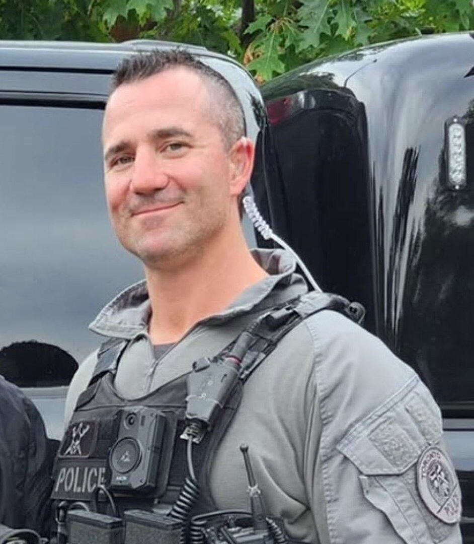 'We have it from here': Police salute fallen Toronto officer at procession
