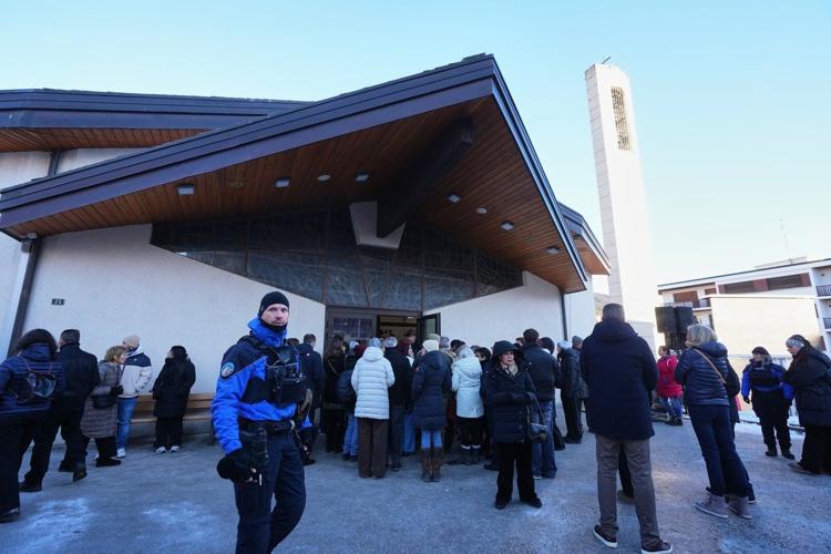 Hundreds march in silence to honor victims of Swiss bar fire that left ...