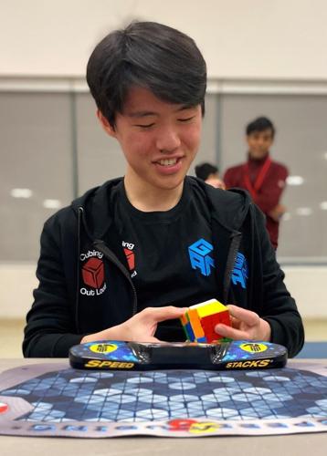 Rubik’s Cube puzzles bring speed and fellowship to Waterloo competition