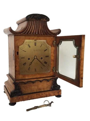 Labatt painting ad, renowned Arnold clock, shark spine cane