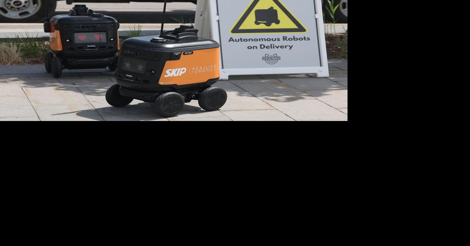 UW robot delivery system on the road, delivering food