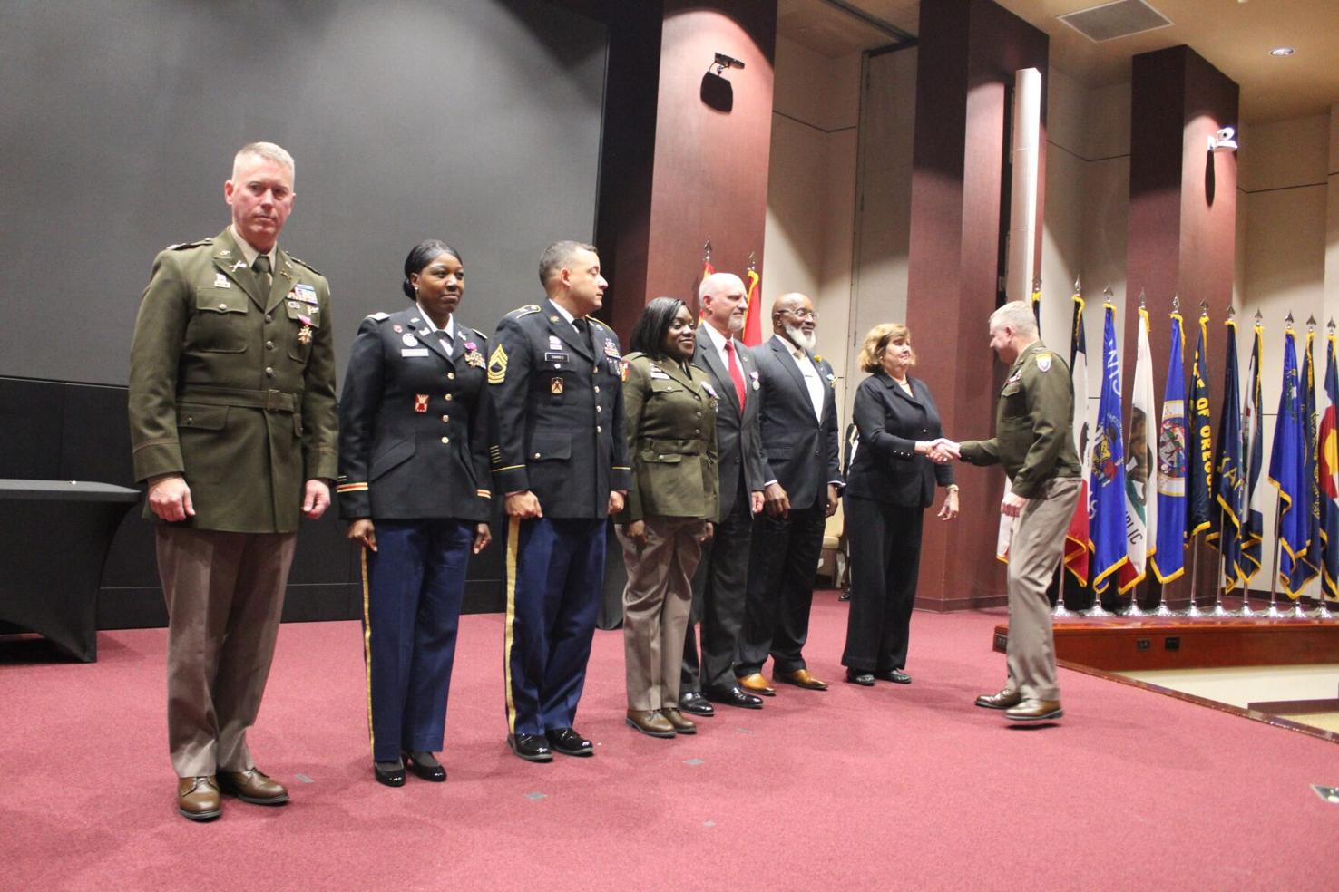 Post retirement ceremony honors seven with their families | Military ...