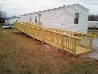 Volunteers build ramp for disabled veteran | Around Town ...