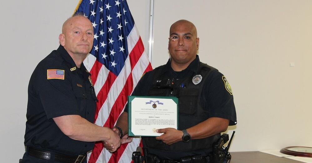Police department honors officer of the year | News | theredstonerocket.com