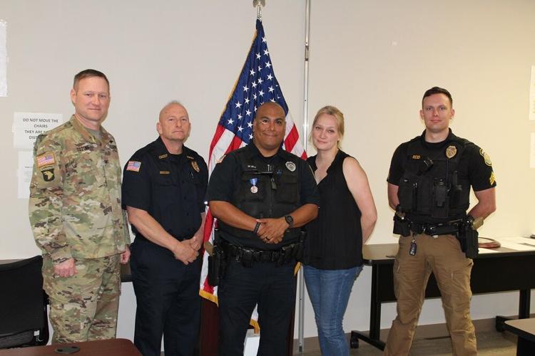 Police department honors officer of the year | News | theredstonerocket.com