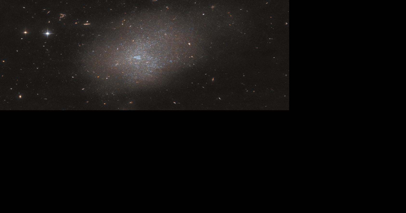 Hubble sees a sparkling neighbor galaxy | Technology Today | theredstonerocket.com