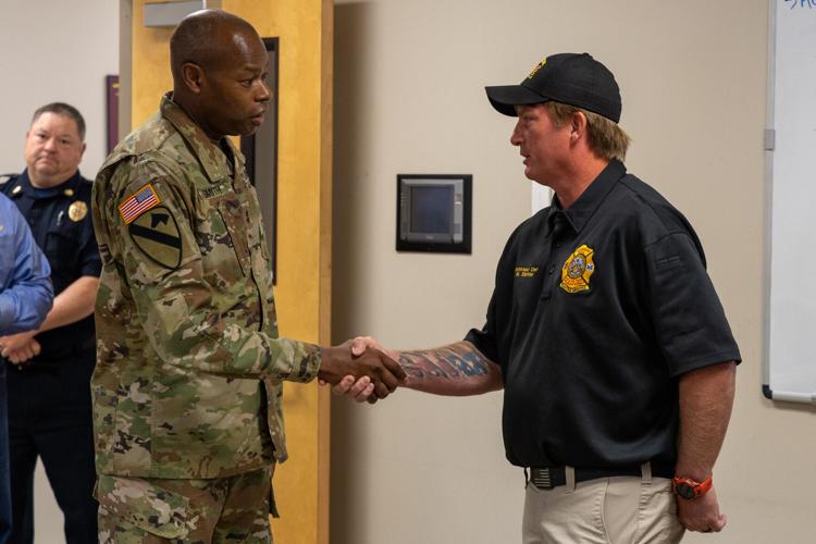 Installation management acting commander presents coins | News ...