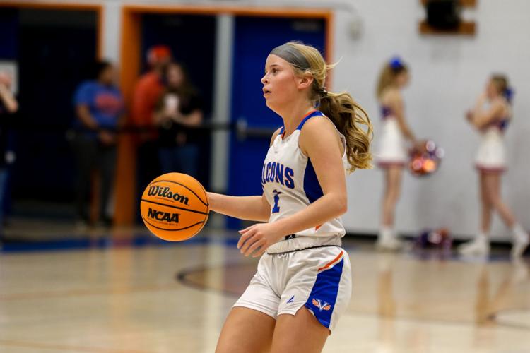 PHOTO GALLERY: Lady Wolves hold off Lady Falcons | Local Sports ...