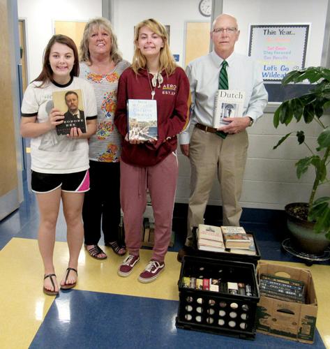 Commissioner donates books from personal collection to Clinch School ...