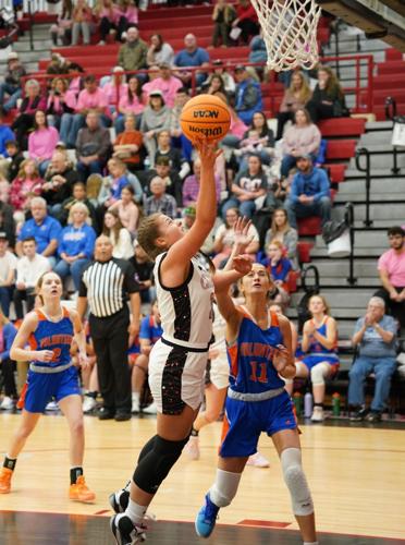 08) Ariel Ferrell drives for a layup | | therogersvillereview.com