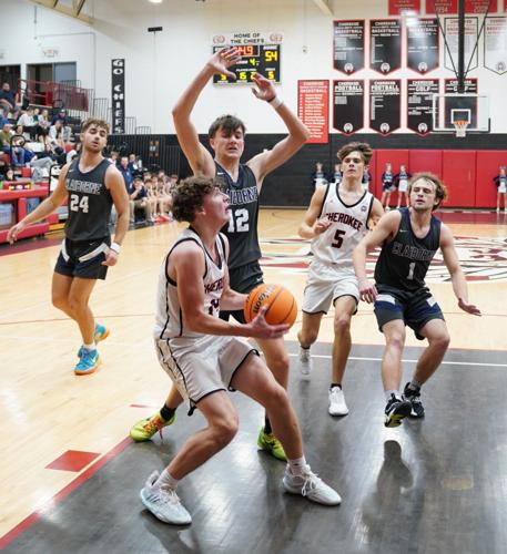 11) Isaiah Jones in the paint. | | therogersvillereview.com