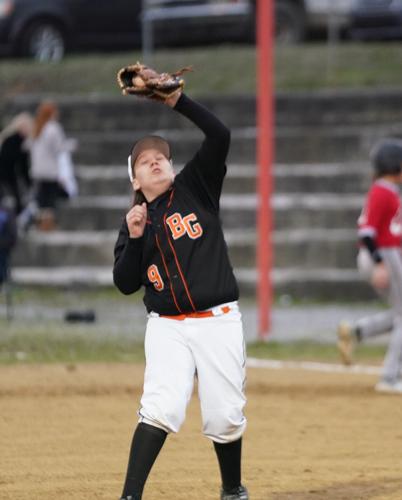 11) Tanner Johnson catches a fly ball. | | therogersvillereview.com