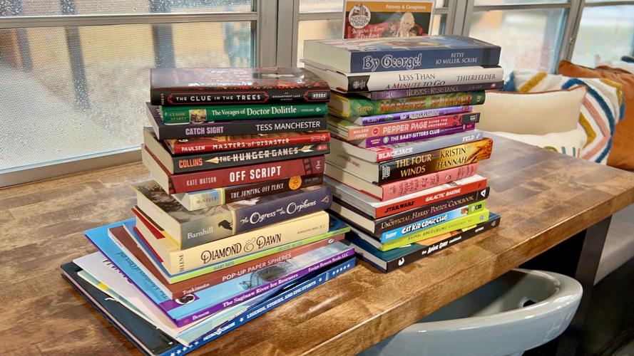 Reading the crowd: Harshbarger delivers books from Library of Congress ...