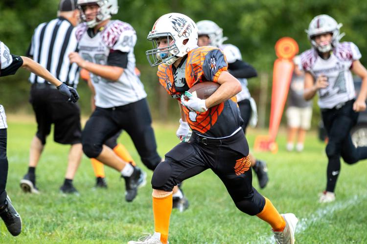 PHOTO GALLERY: Warriors topple Eagles | Sports | therogersvillereview.com