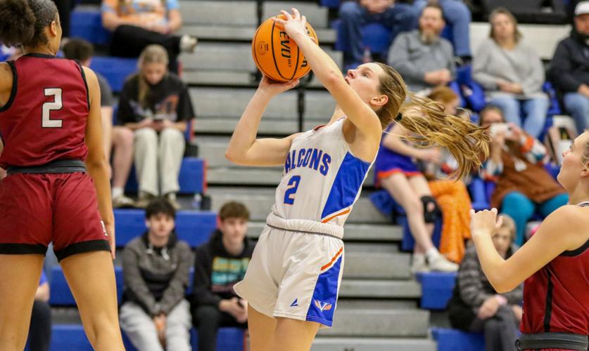 PHOTO GALLERY: Lady Trojans take down Lady Falcons | Multimedia | therogersvillereview.com