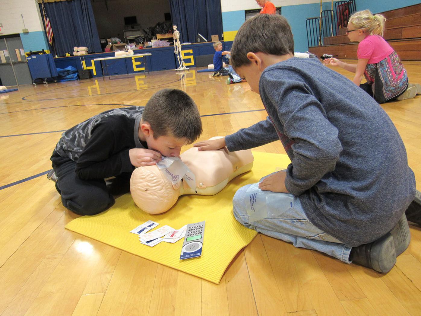 Hawkins Elementary students get CPR training | Education ...