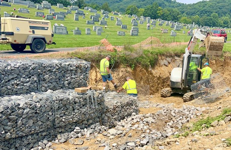Work continues to halt City Park erosion threatening Highland Cemetery ...