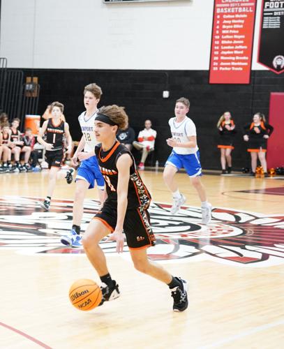 Grant Johnson pushing the ball | | therogersvillereview.com