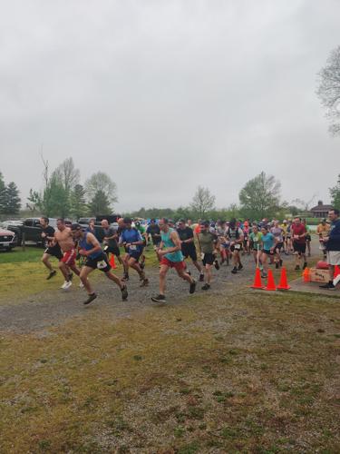 PHOTO GALLERY: Hughes, Warner conquer trail to win Laurel Run Ascent ...