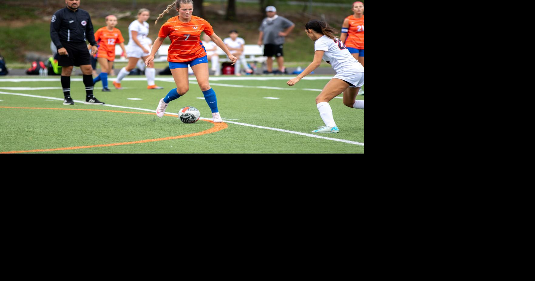 PHOTO GALLERY: Volunteer slips past Grainger | Sports ...