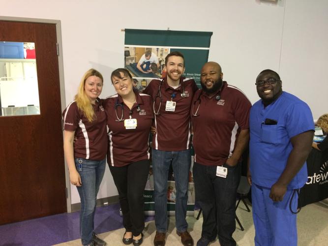 Mobile dentists exam, clean teeth of youth at community Back-to-School ...