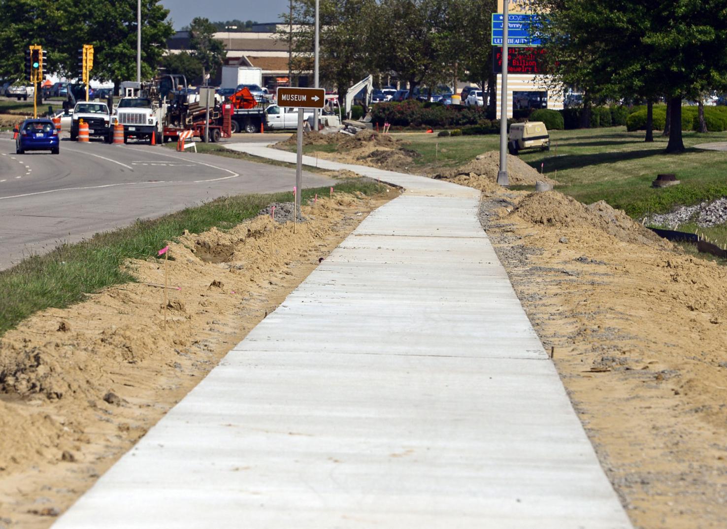 Getting around: Sidewalk construction to help pedestrians become more ...
