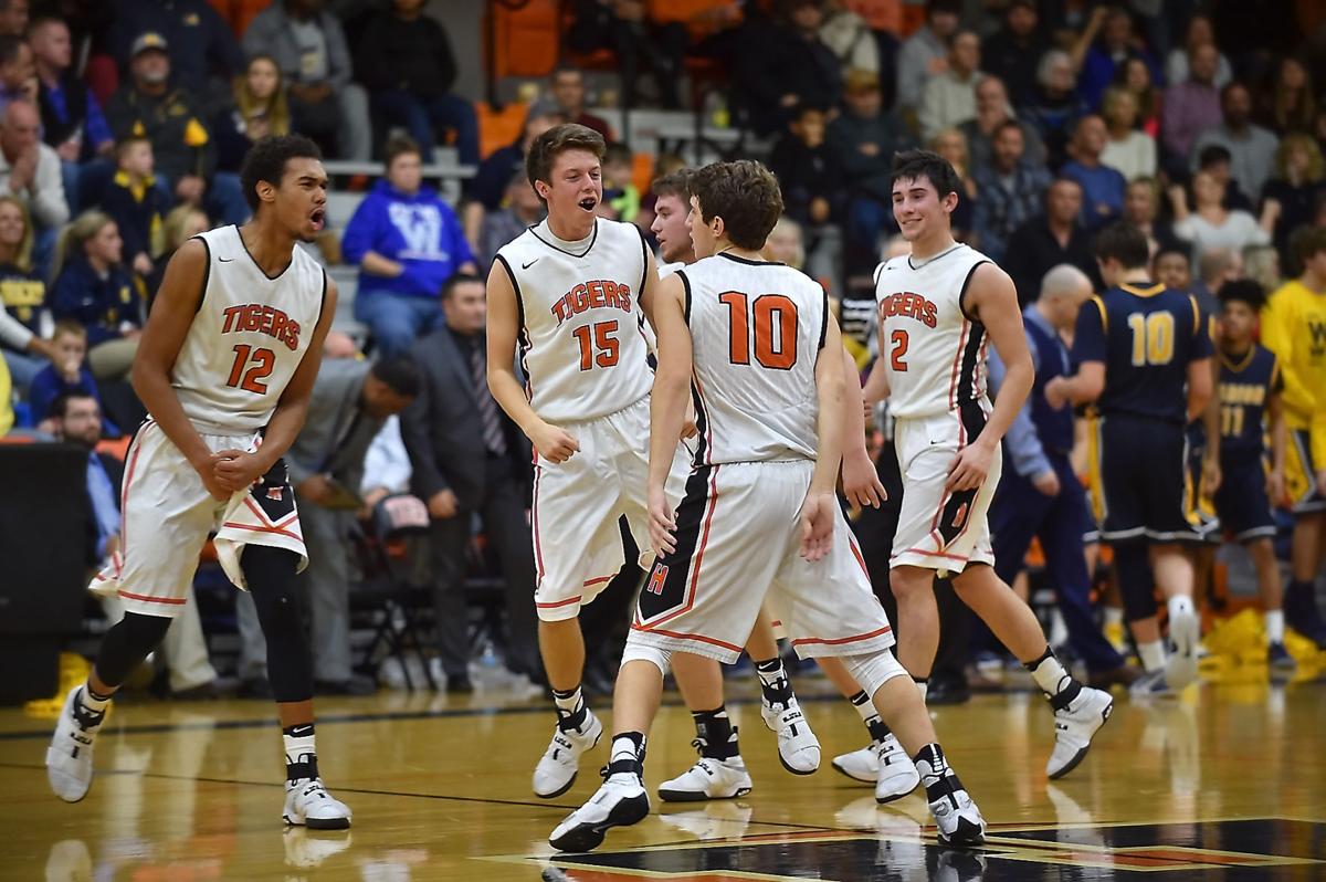 Photos: Herrin Tigers Defeat Marion Wildcats in Basketball