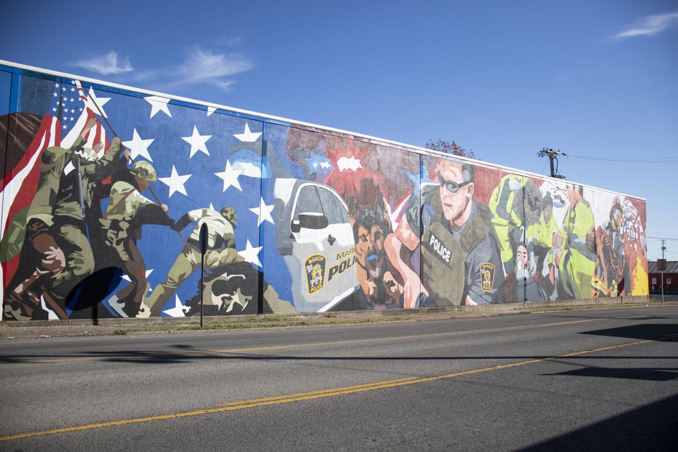 Watch now: New mural in Marion honors military heroes, police ...