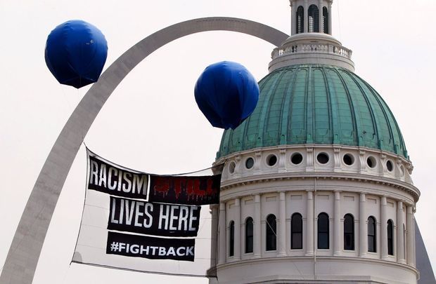 More arrests in Ferguson overnight after day of civil disobedience in ...