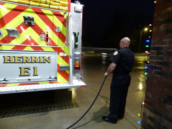 Herrin Fire Department dedicates new truck by pushing into station ...
