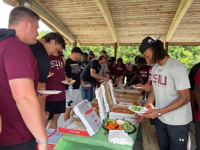 SIU football members team up to clean up | Local News | thesouthern.com