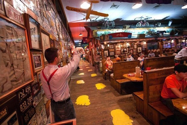 St. Louis woman sues Lambert's – the 'Home of Throwed Rolls' – for ...