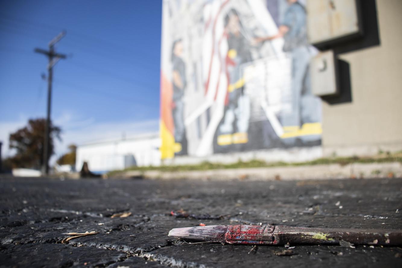 Watch now: New mural in Marion honors military heroes, police ...