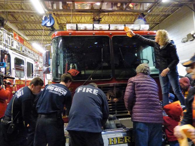 Herrin Fire Department dedicates new truck by pushing into station