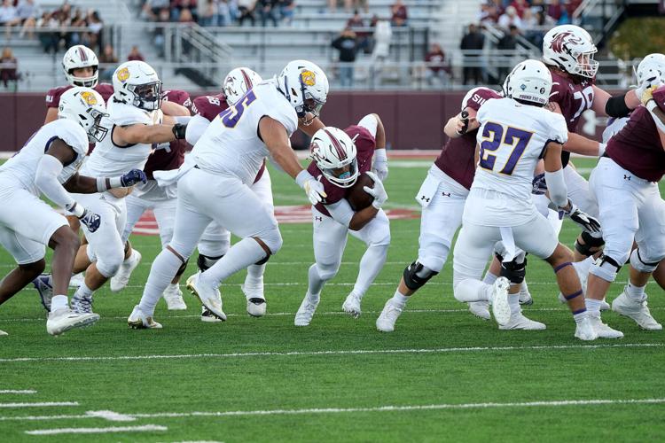 SIU Football | Salukis cruise over Western Illinois, Baker sets record ...