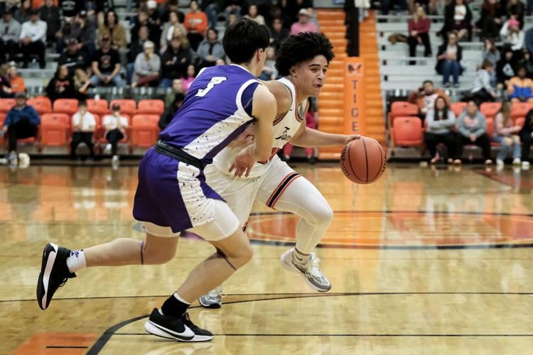 Boys Basketball | Collinsville gets past Herrin in opener | High School ...