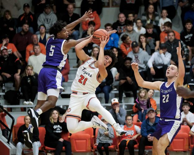 Boys Basketball | Collinsville gets past Herrin in opener | High School ...