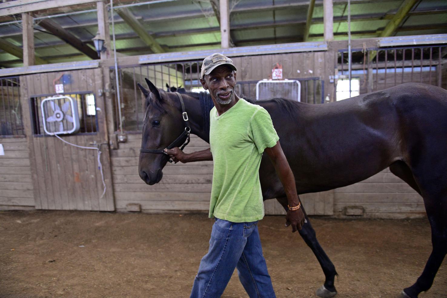 Photos: Veteran harness racing trainer prepares for state fair races